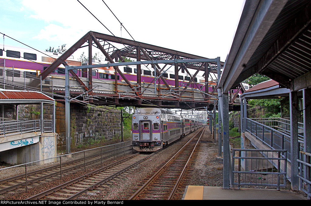 MBTA 1706, Tr. 919 With Fairmont Line Train on Bridge